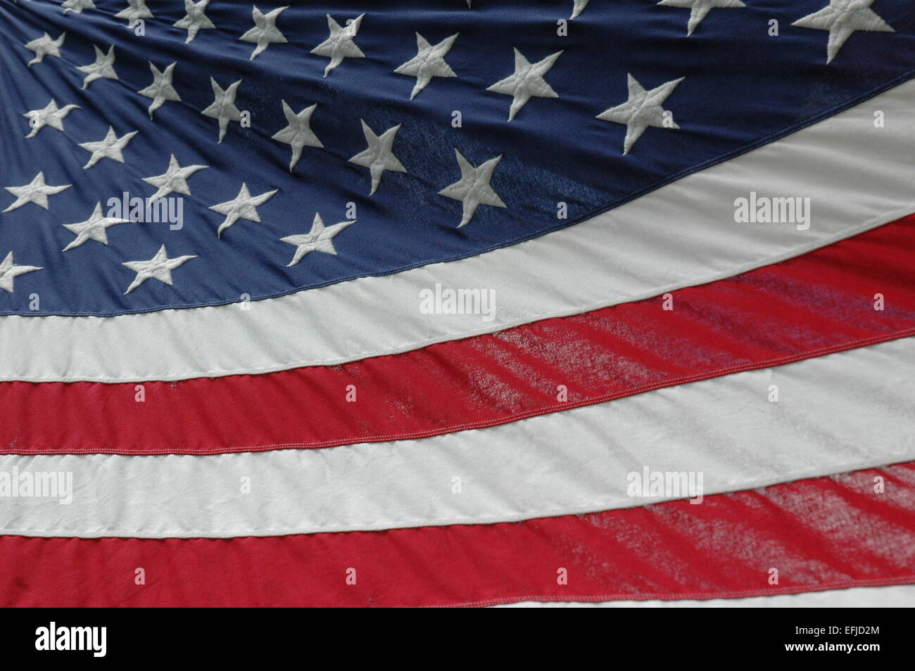 American flag flying in breeze Stock Photo - Alamy