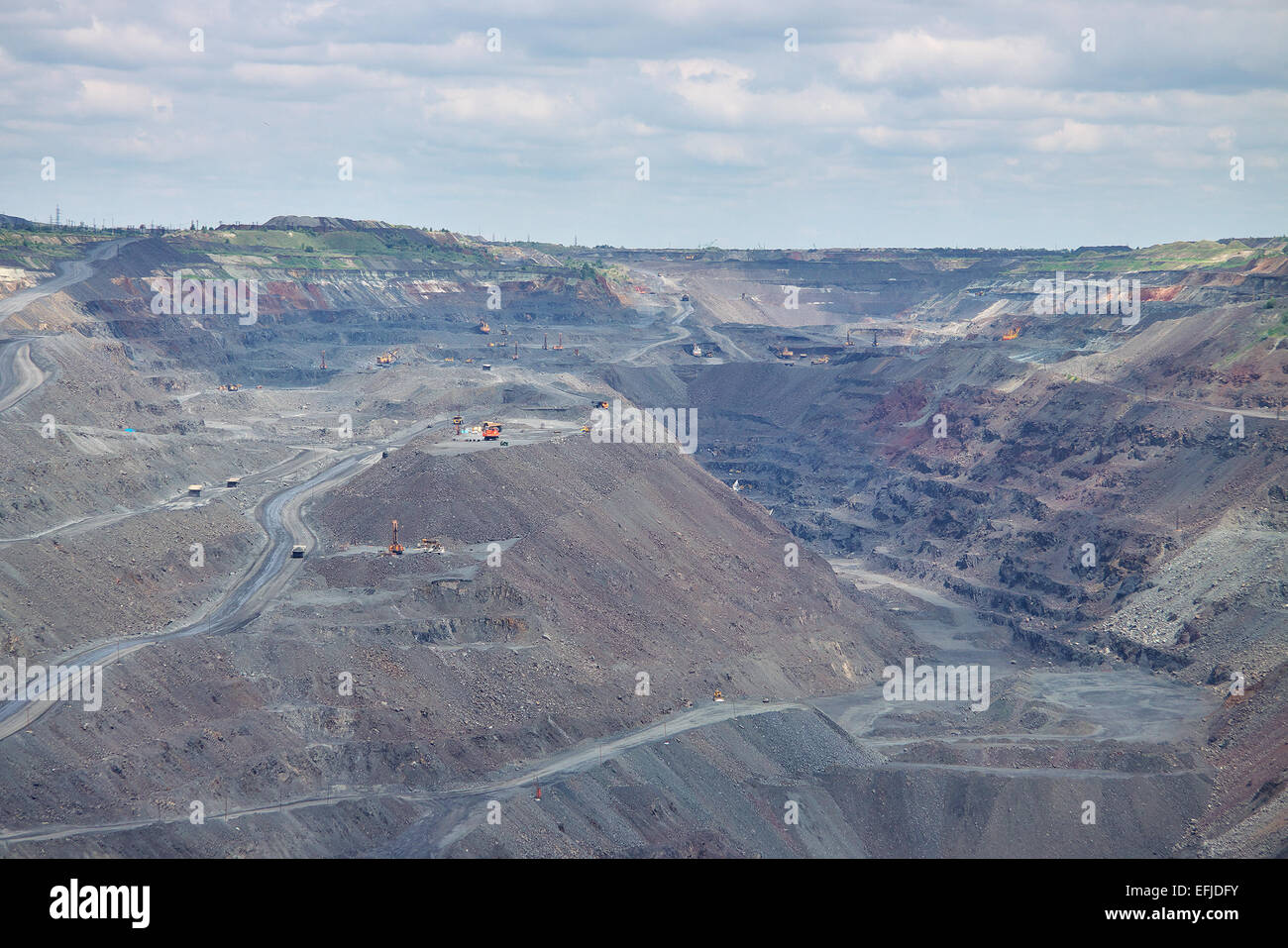 Iron ore opencast mining - the side view of the pit Stock Photo - Alamy