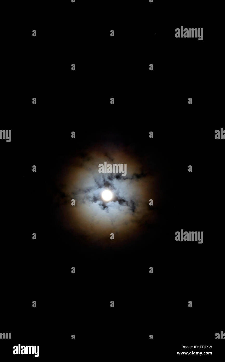 Full moon through cloud cover hi-res stock photography and images - Alamy