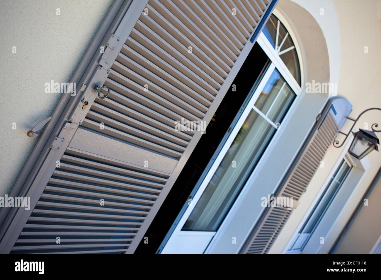 Shutters and window on a terrace Stock Photo - Alamy
