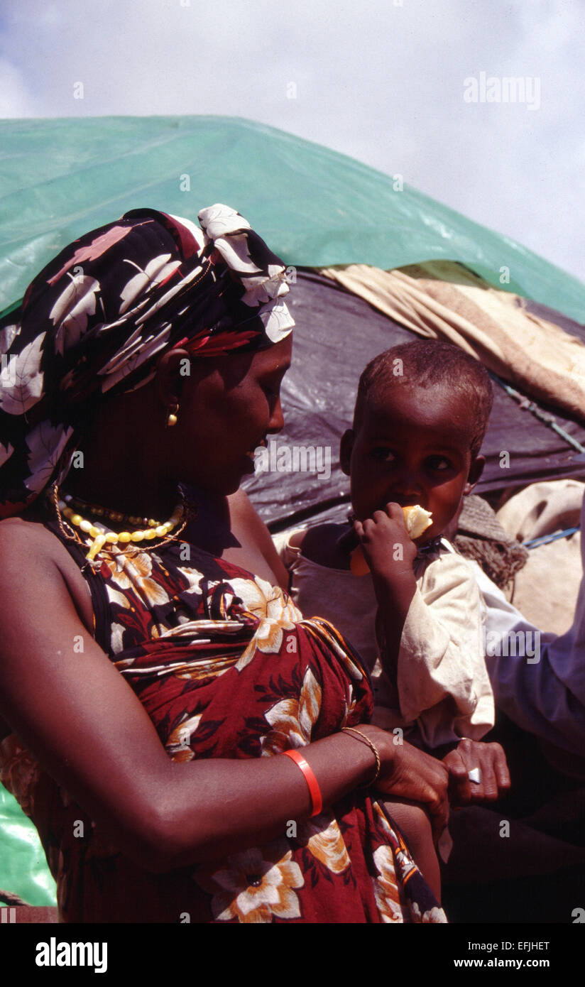 Somali mother and child in a makeshift IDP camp just outside Mogadishu ...