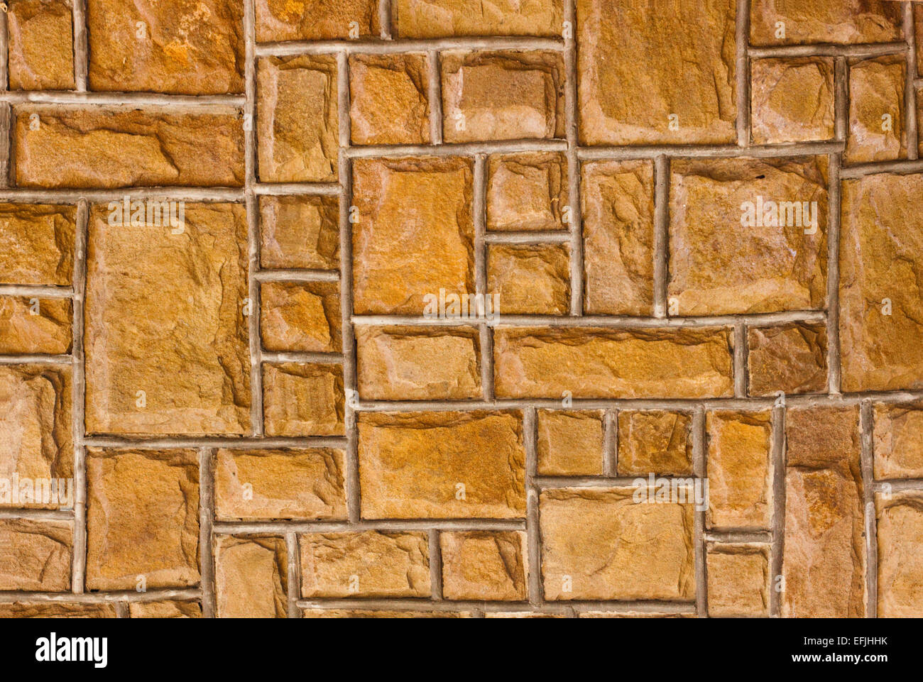 External brown stone wall background Stock Photo - Alamy