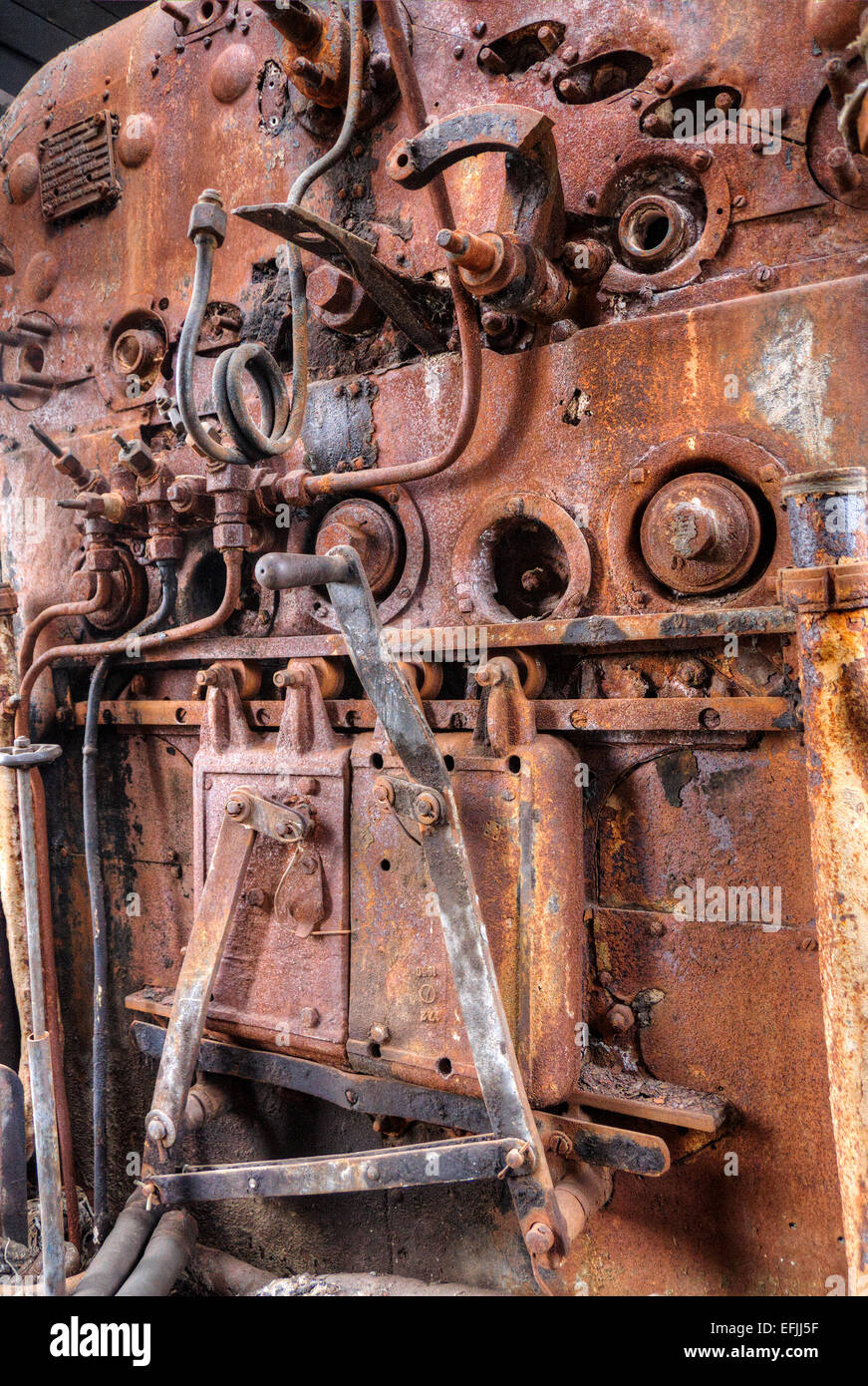Old steam train engine with rust and damage Stock Photo - Alamy