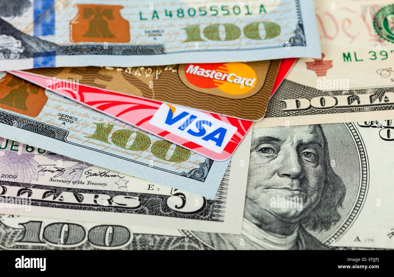 Photo of VISA and Mastercard credit card with american dollars Stock ...