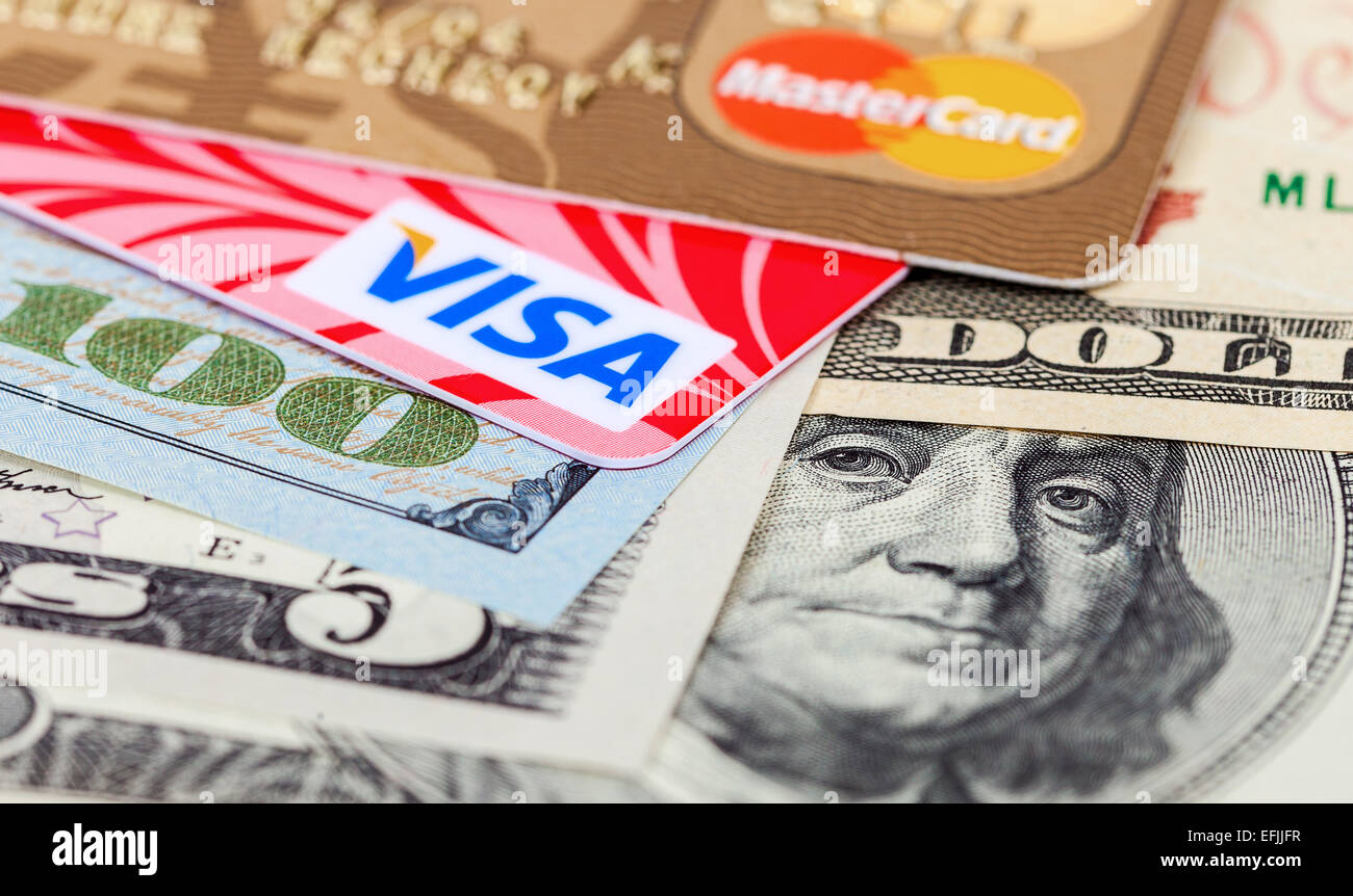 Photo of VISA and Mastercard credit card with american dollars Stock ...