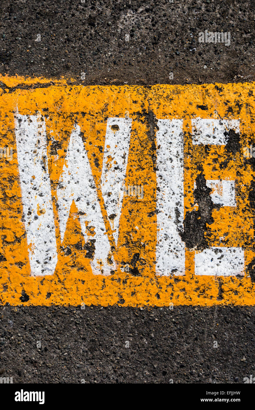 Part of a welcome sign for vehicles entering a parking lot in downtown ...