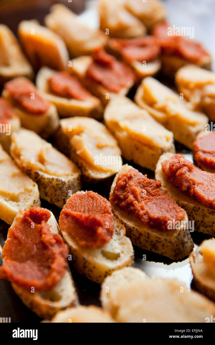 Vegetable puree on toasts for a buffet Stock Photo - Alamy