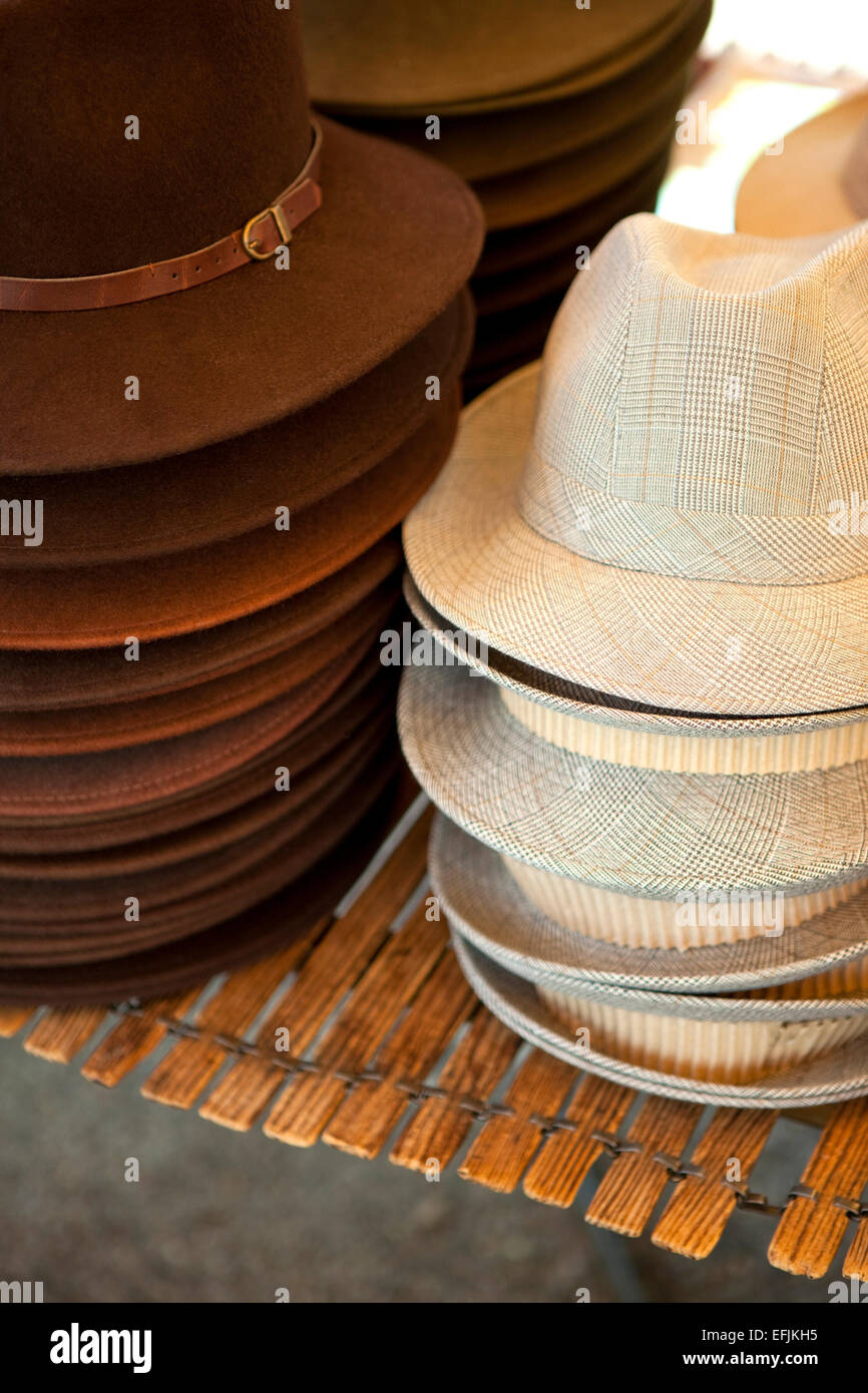 Pile of men hats on a market stall Stock Photo - Alamy