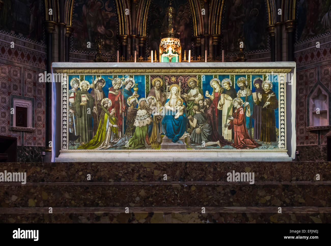 Colourful painted altar of the adoration of the Madonna and child at St ...
