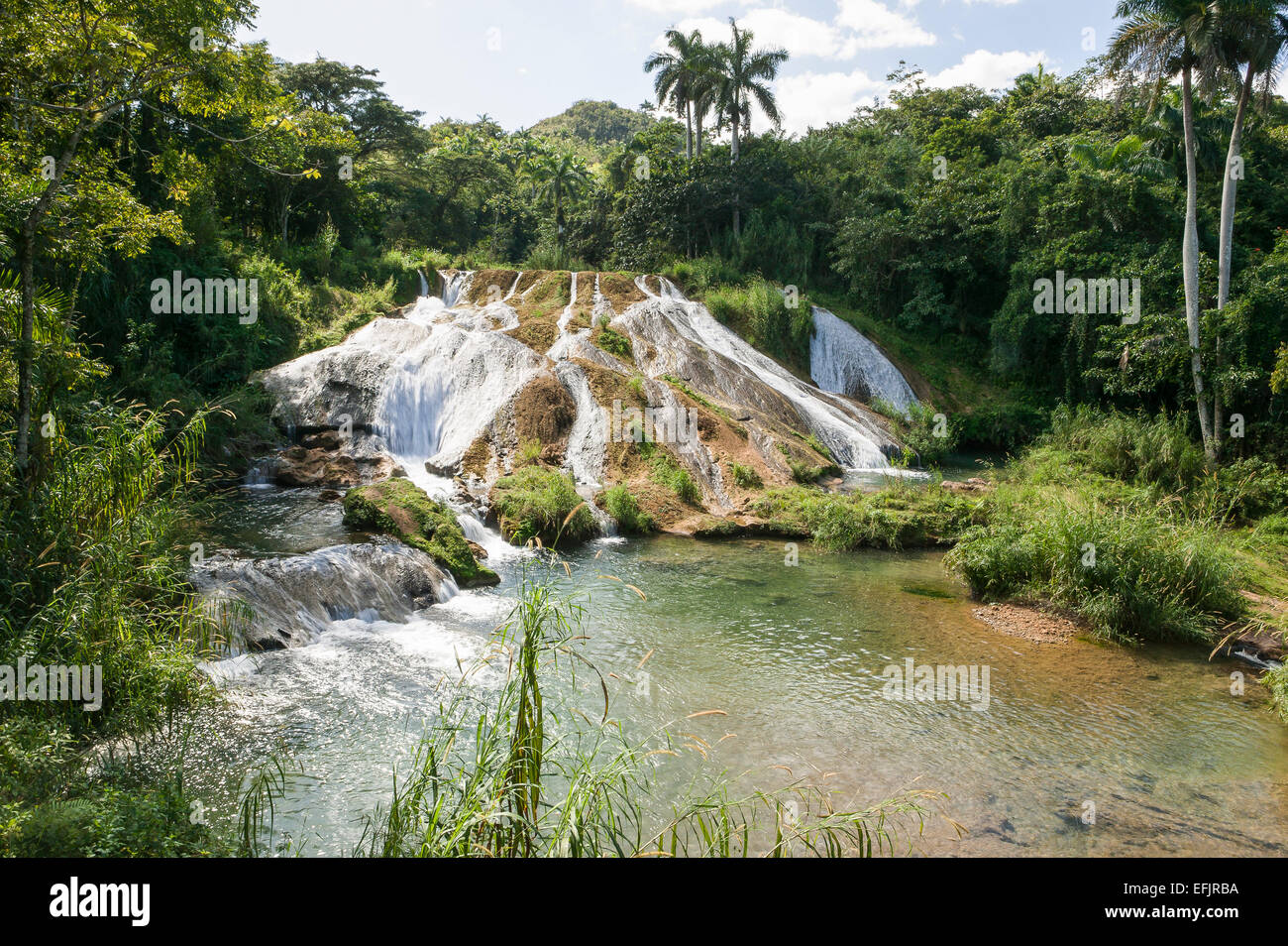One of the lower falls of El Nicho located on the Hanabanilla River, in ...