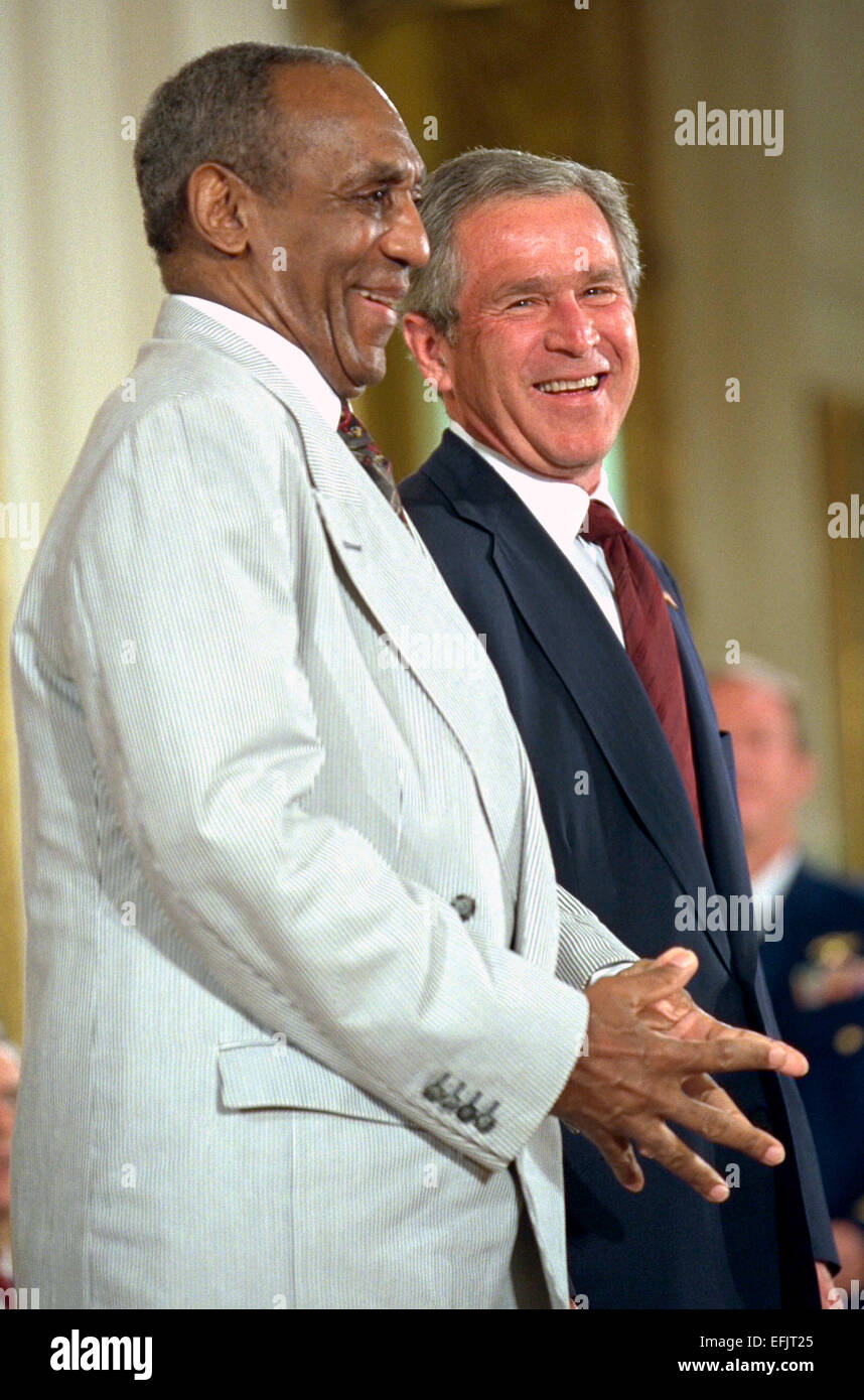 US President George W. Bush shares a laugh with comedian Bill Cosby ...