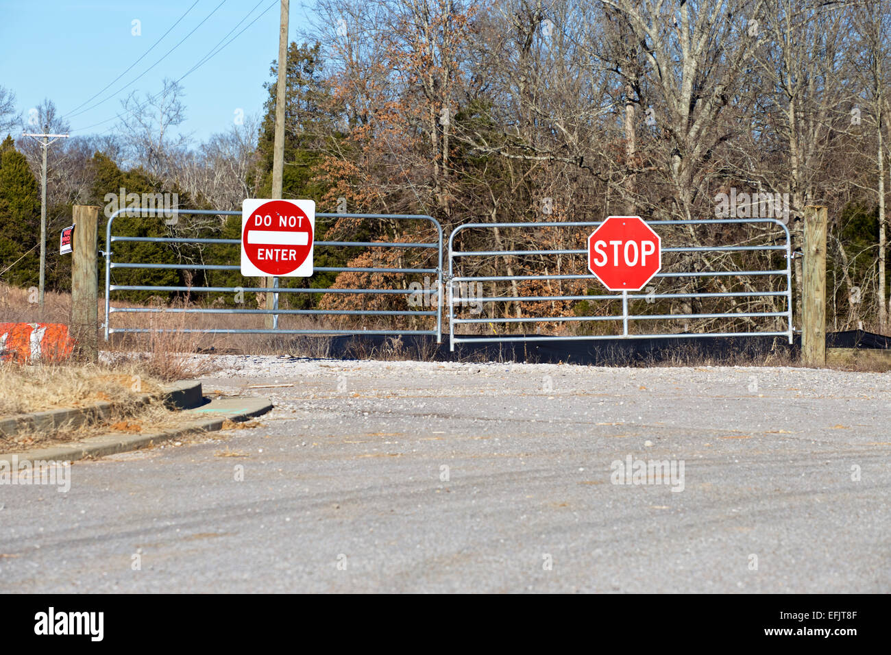 Do not enter sign and stop stop post on fence gate outside field Stock ...