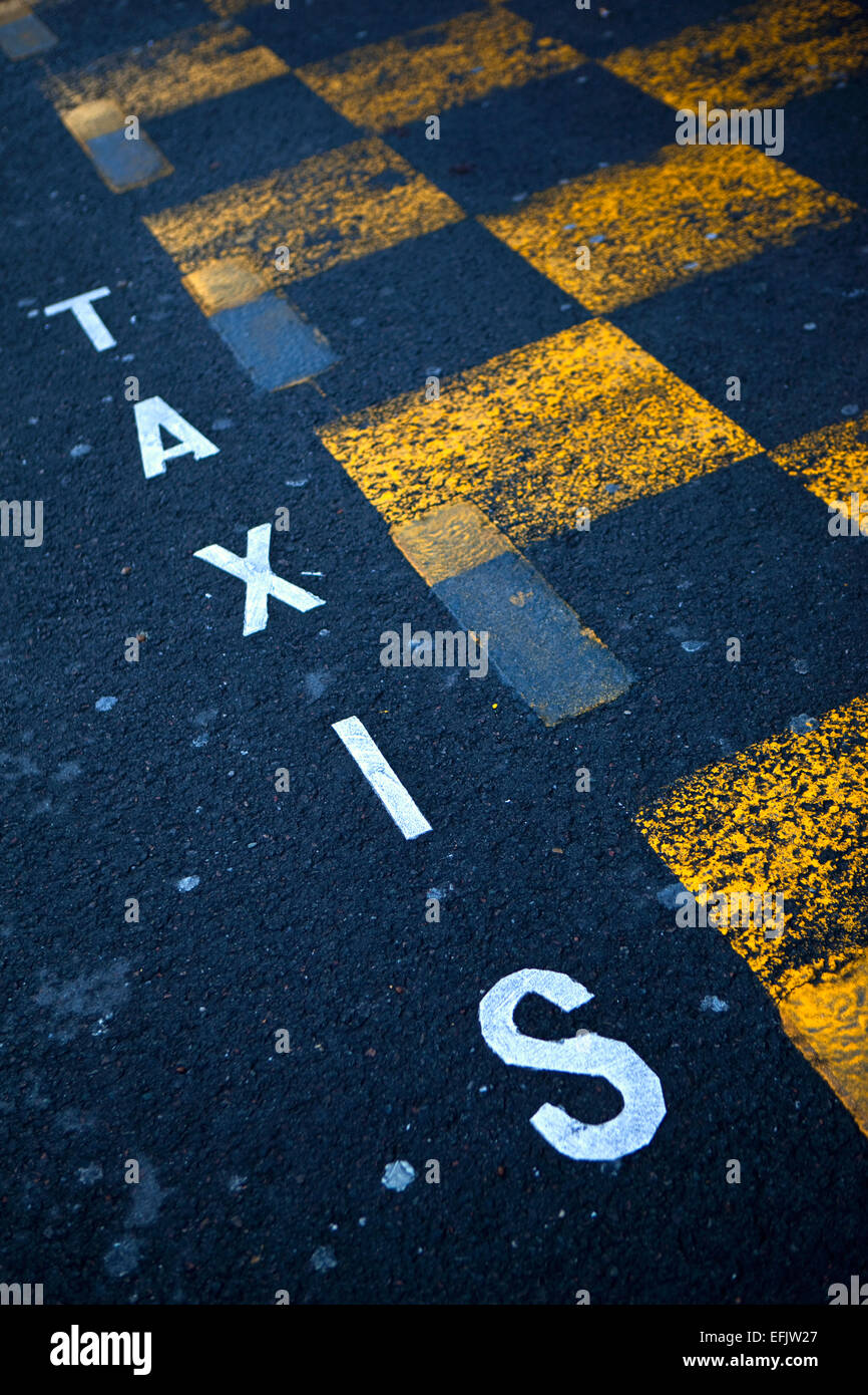 Taxi parking in a street Stock Photo - Alamy