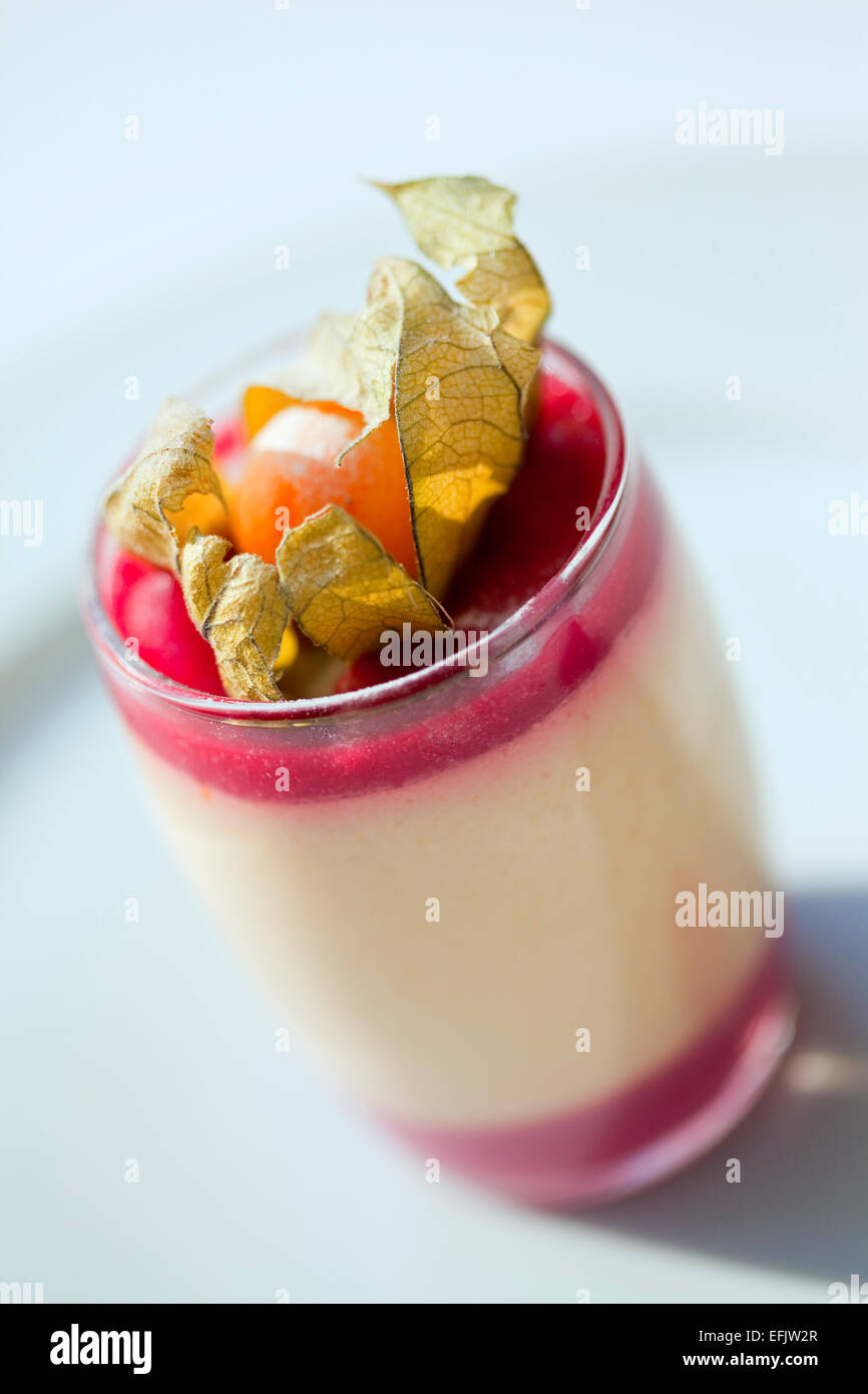 Vanilla cream and red fruit mousse in a glass Stock Photo - Alamy