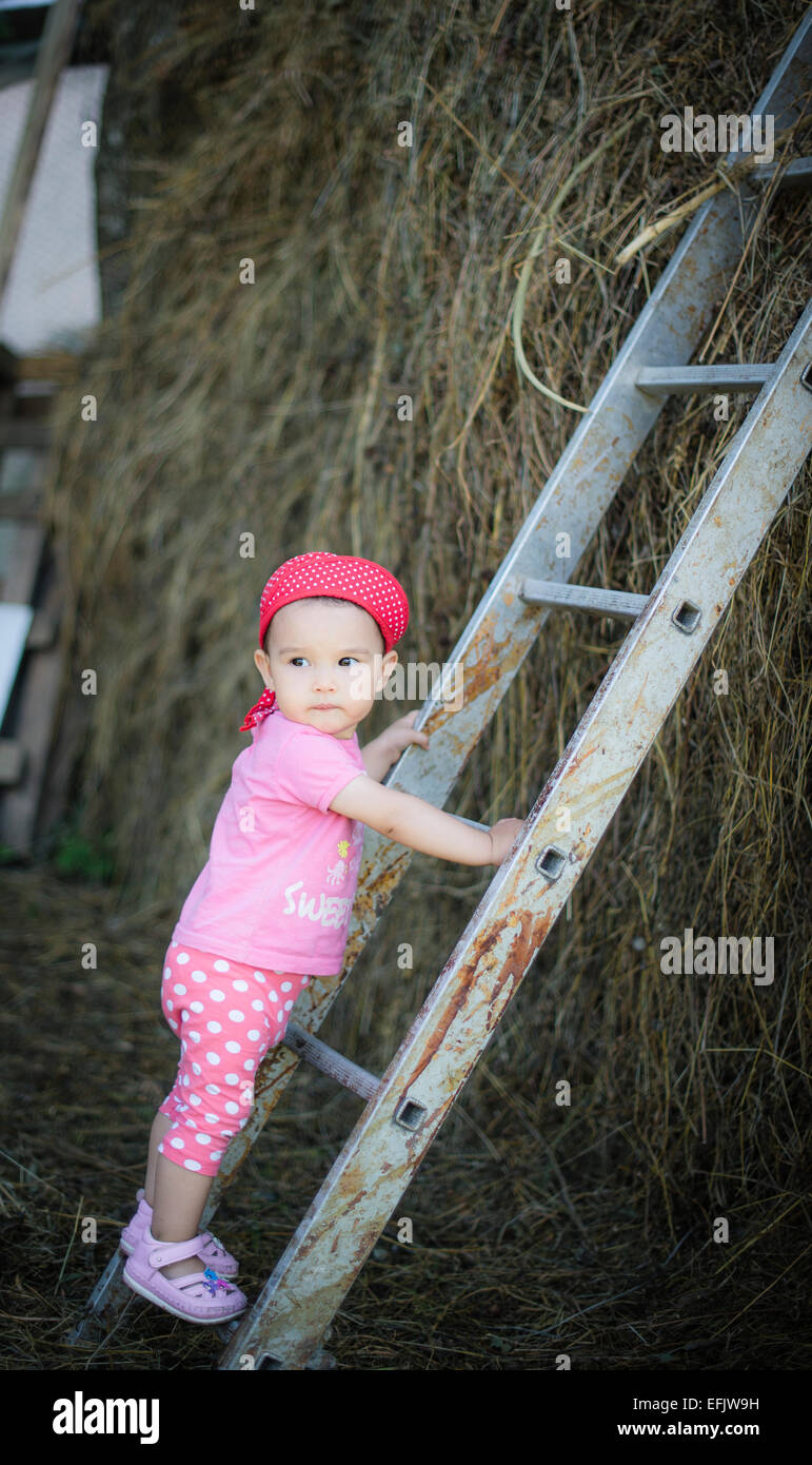 Toddler climb up ladder hi-res stock photography and images - Alamy