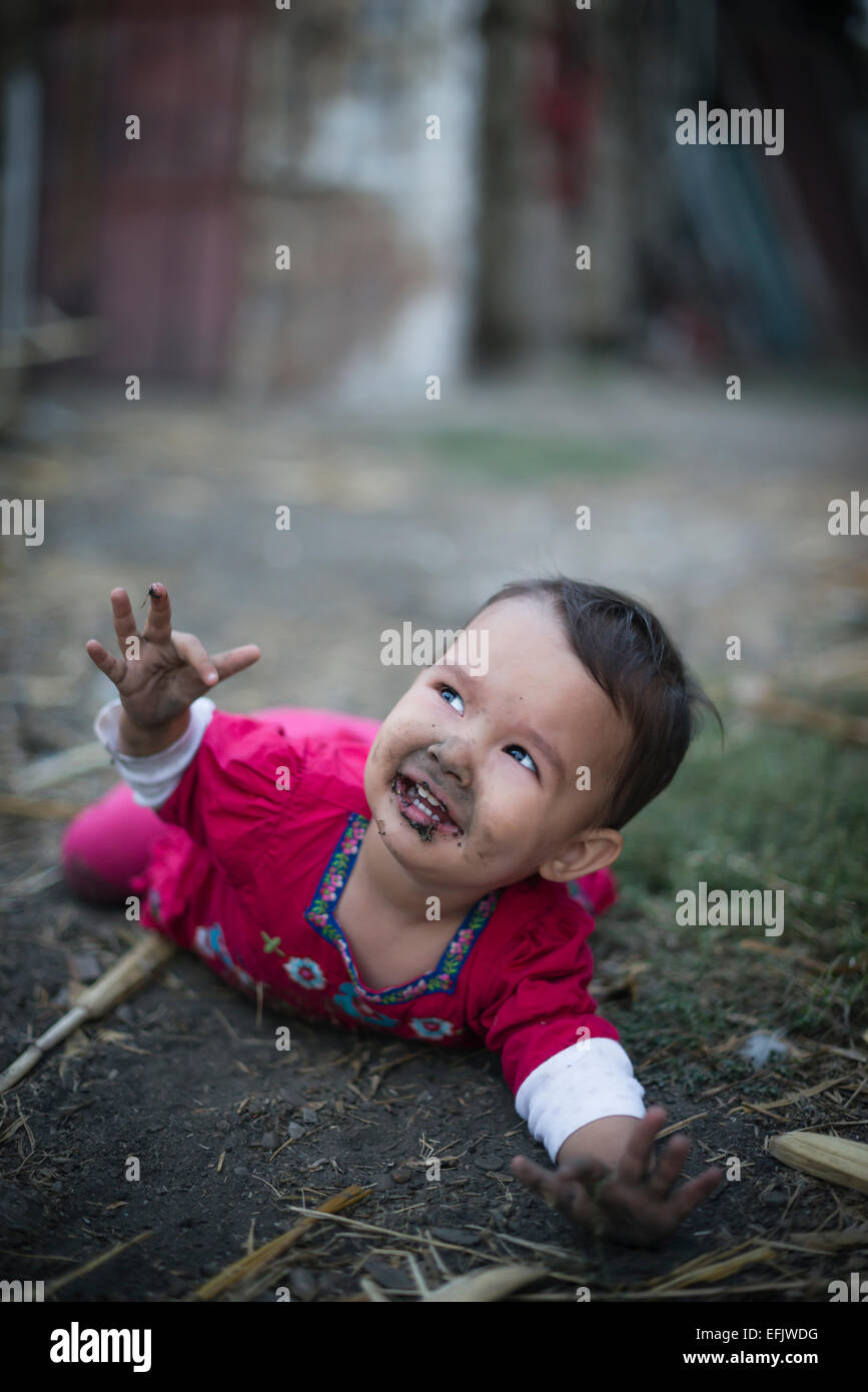 A little girl fallen into dust Stock Photo - Alamy