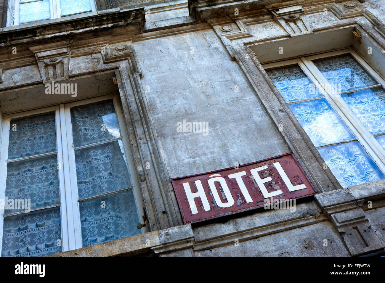 Facade of an old French hotel Stock Photo - Alamy