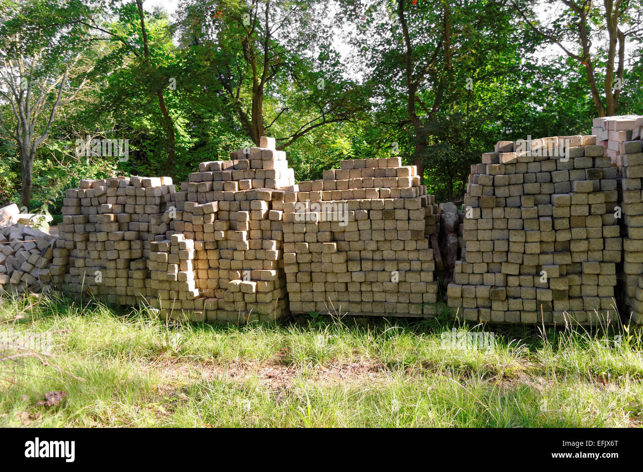 new packed cobblestone in the city park Stock Photo - Alamy