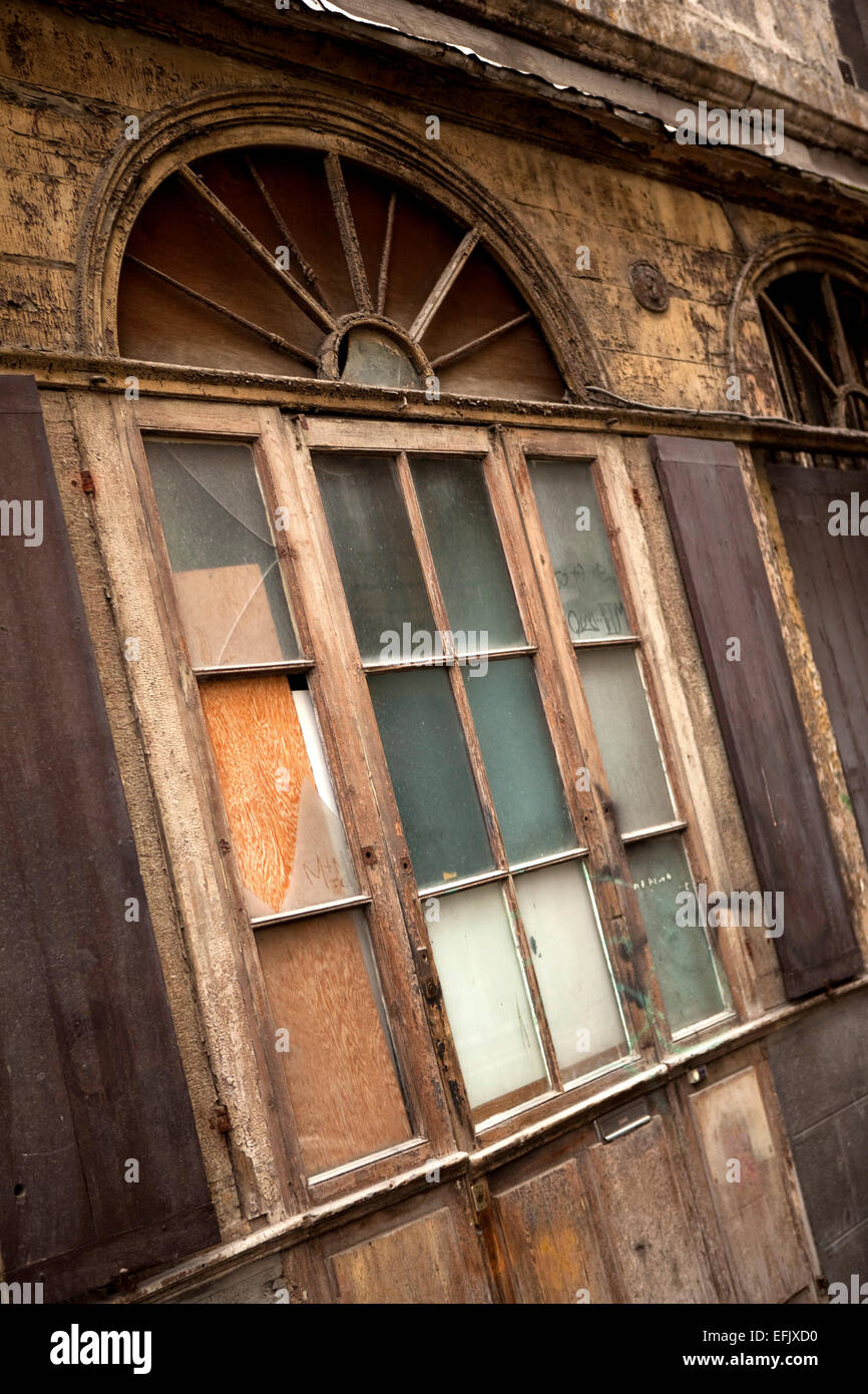 Facade of a slum in the city Stock Photo - Alamy