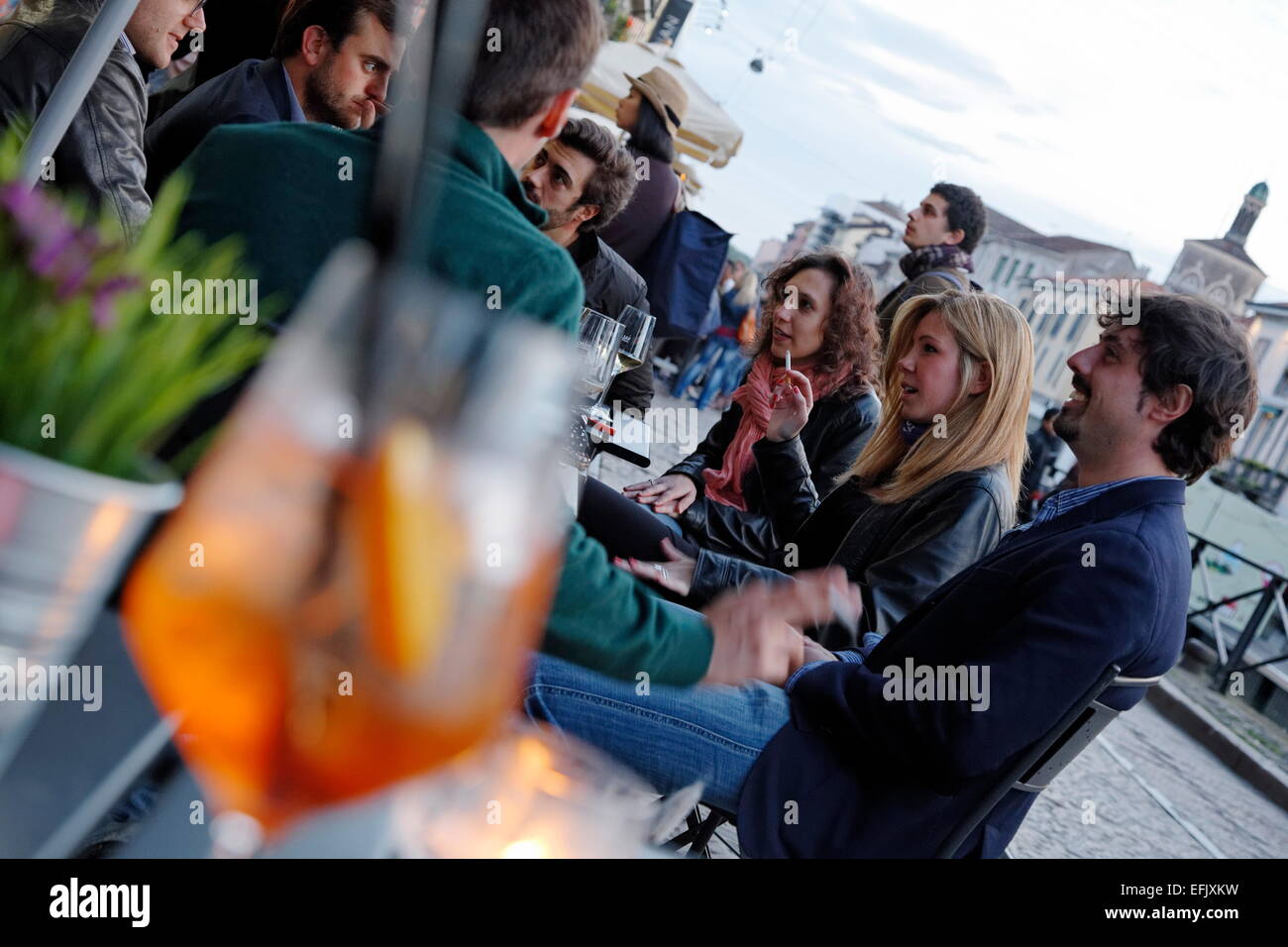Guests in a bar, Navigli quarter, Milan, Lombardy, Italy Stock Photo ...