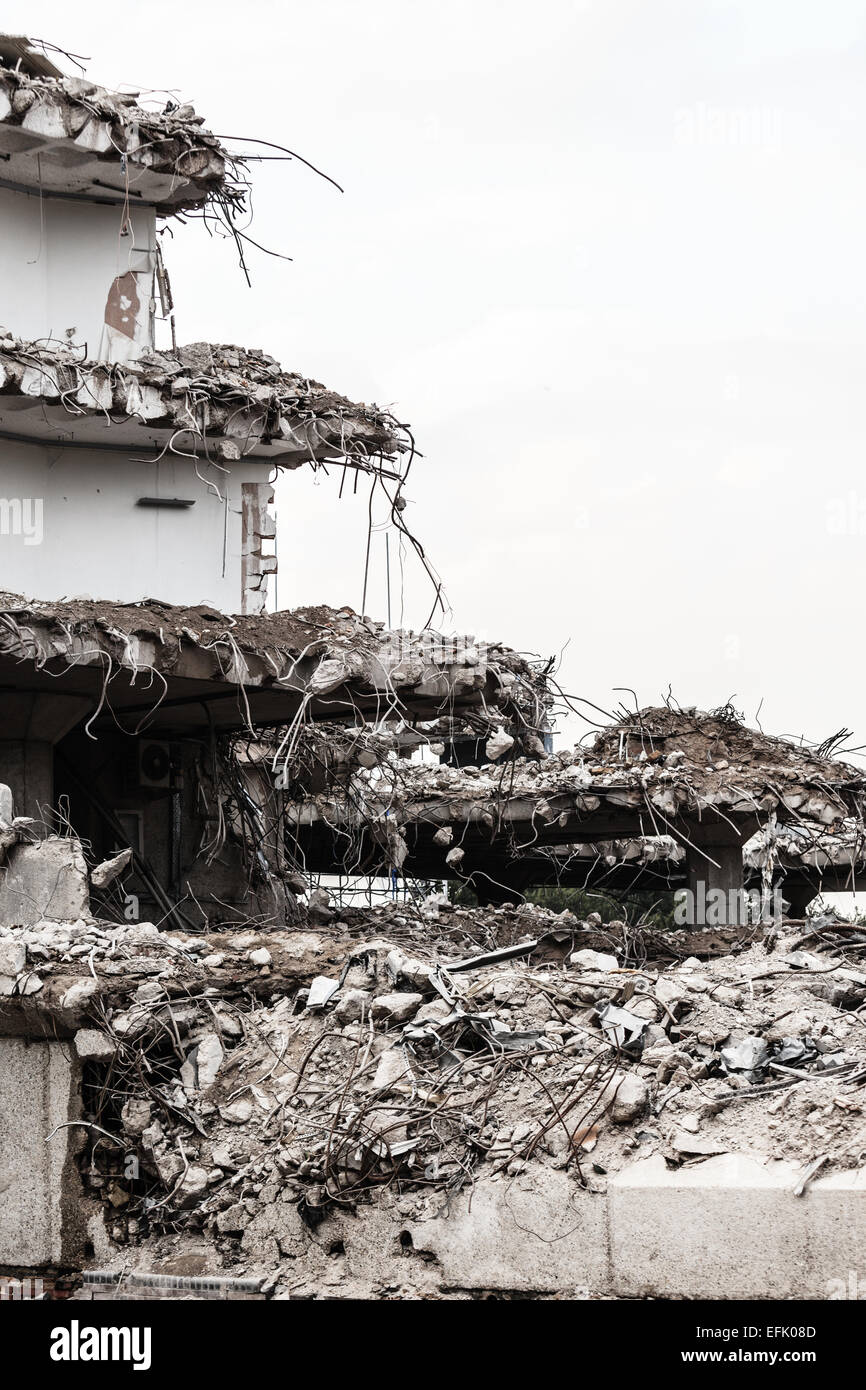 Urban scene. Dismantling of a house. Ruins of building under ...