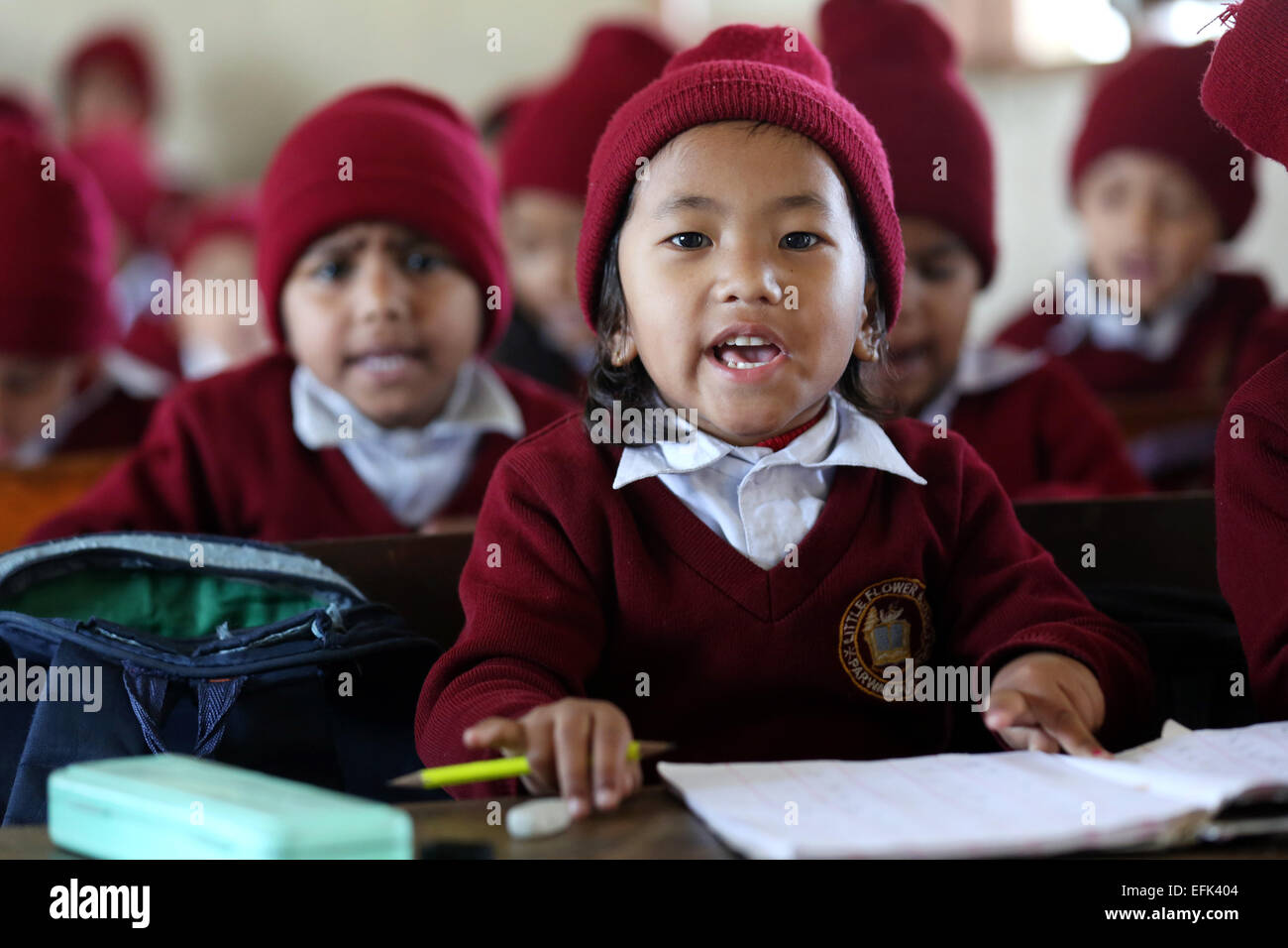 Girls in school uniform in their classroom - Little Flower Primary ...