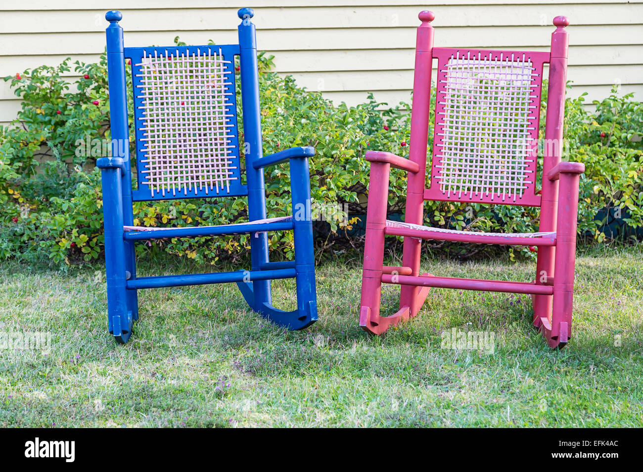 A rustic style of outdoor rocking chairs Stock Photo - Alamy