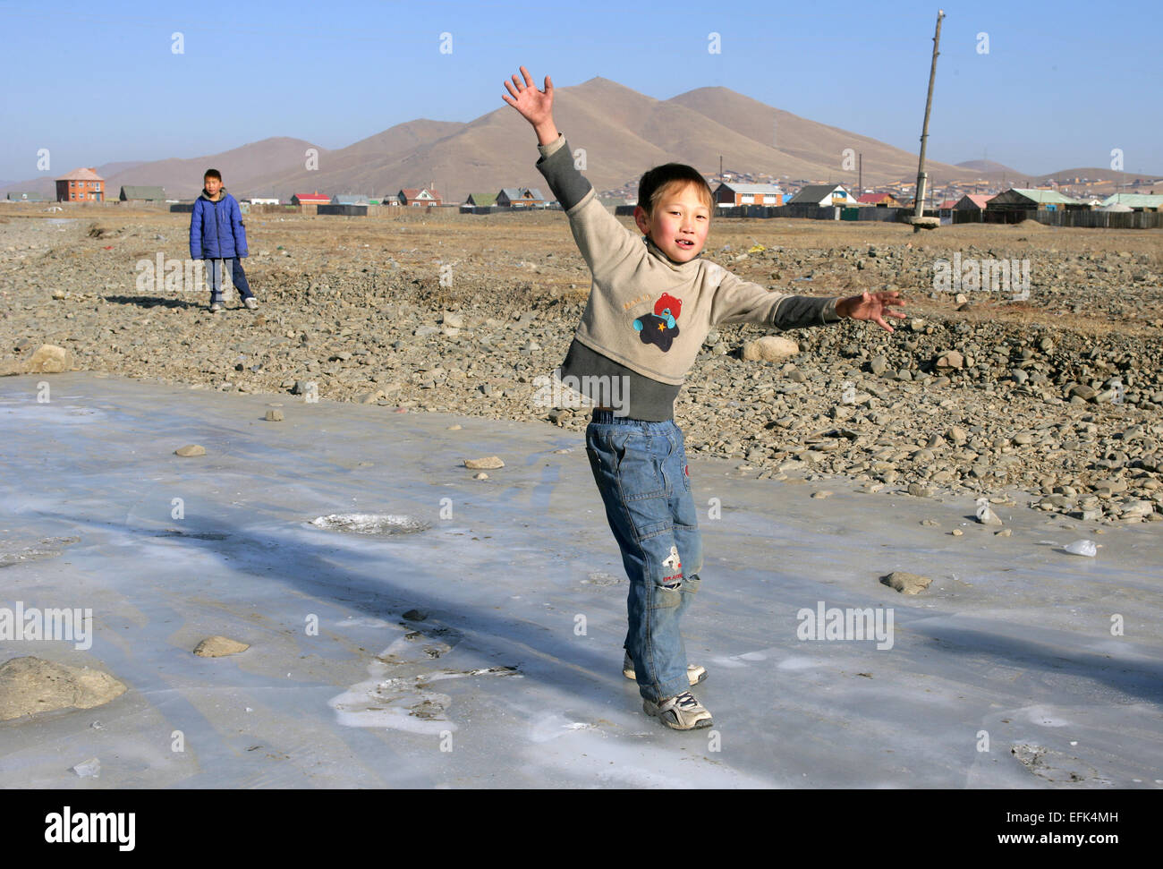 Sliding on ice of frozen pond hi-res stock photography and images - Alamy