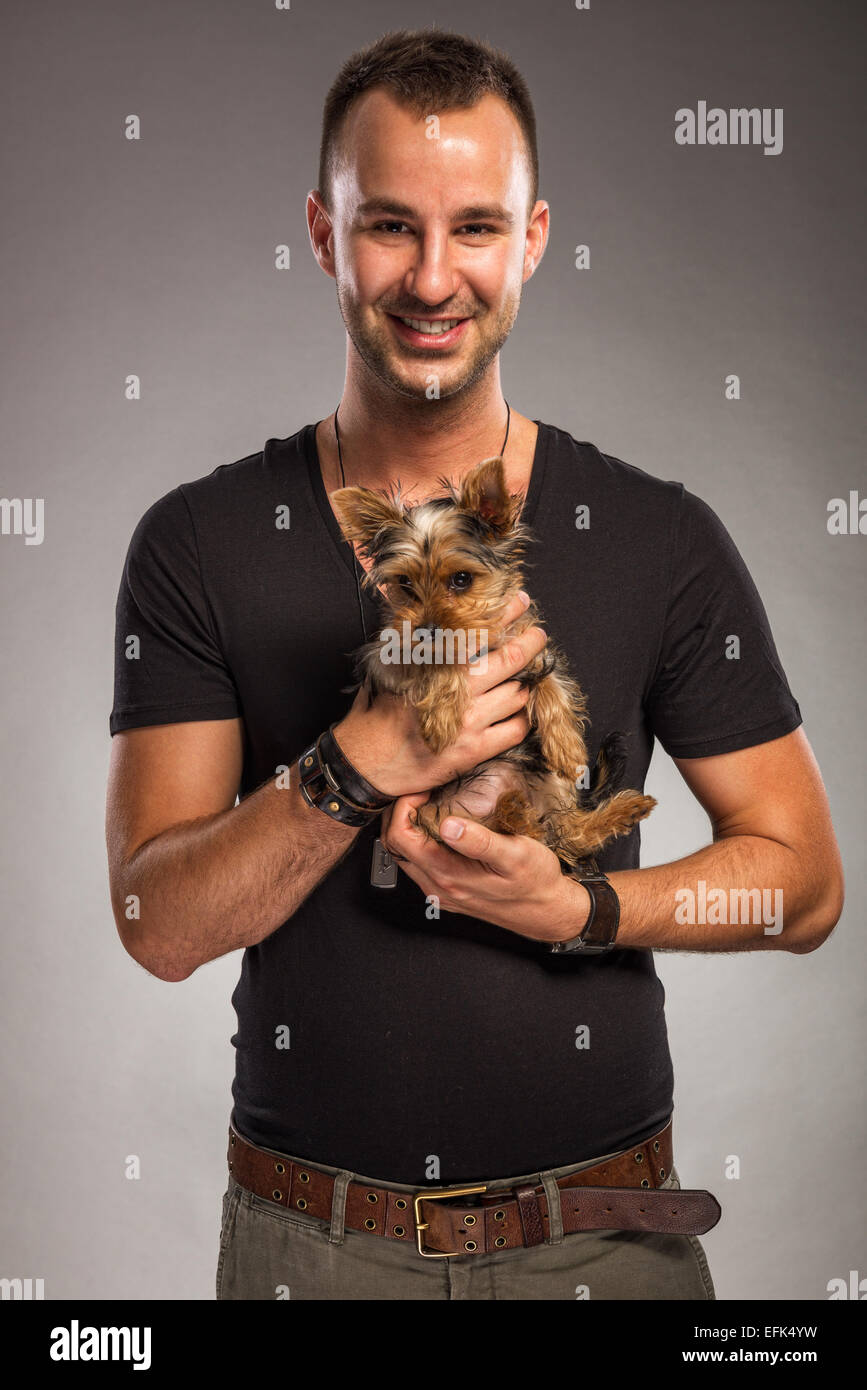 Man holding dog dogs hi-res stock photography and images - Alamy