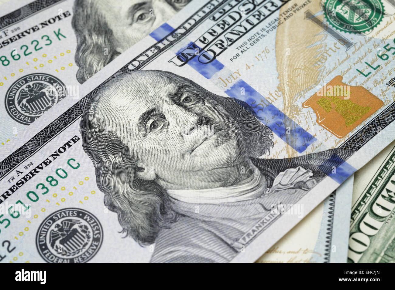 new hundred dollar notes on heap of old notes Stock Photo - Alamy