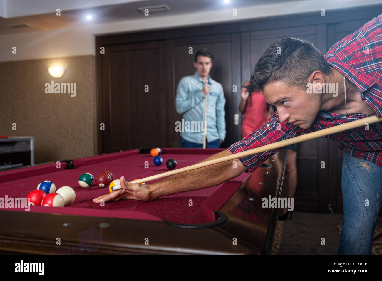 Fun with friends during playing billiard Stock Photo - Alamy