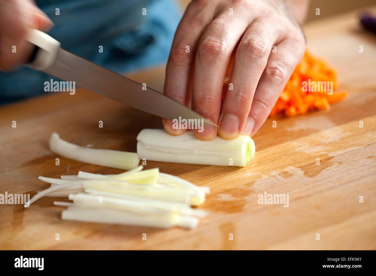 Chef cutting vegetable in a kitchen Stock Photo - Alamy