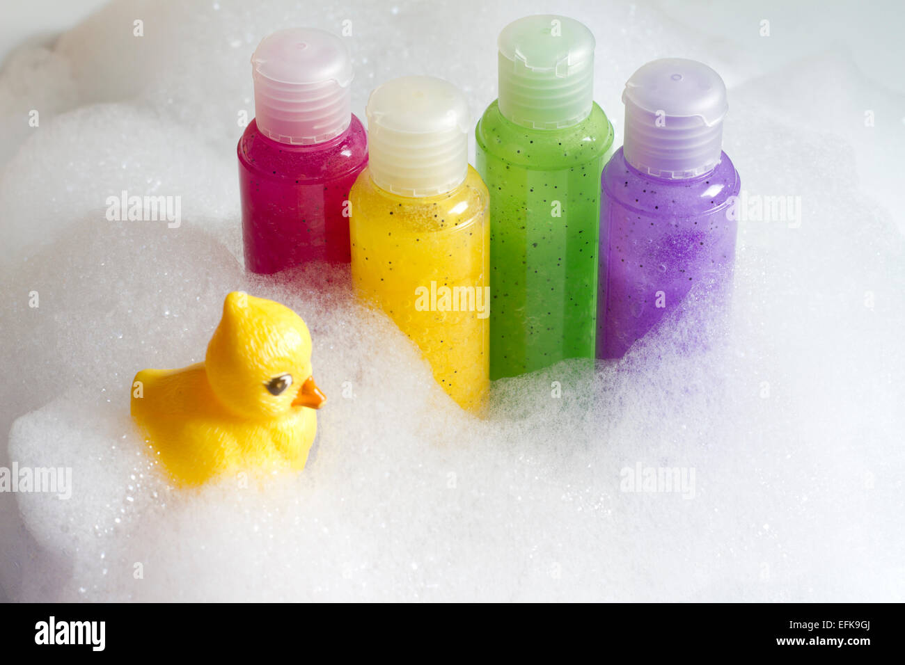 Colorful soaps cosmetics in the bathroom in foam abstract Stock Photo ...