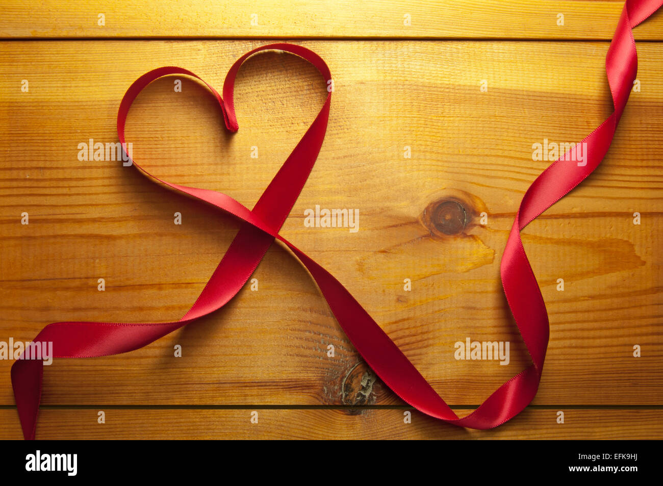 Heart shape ribbon made from silk Stock Photo - Alamy