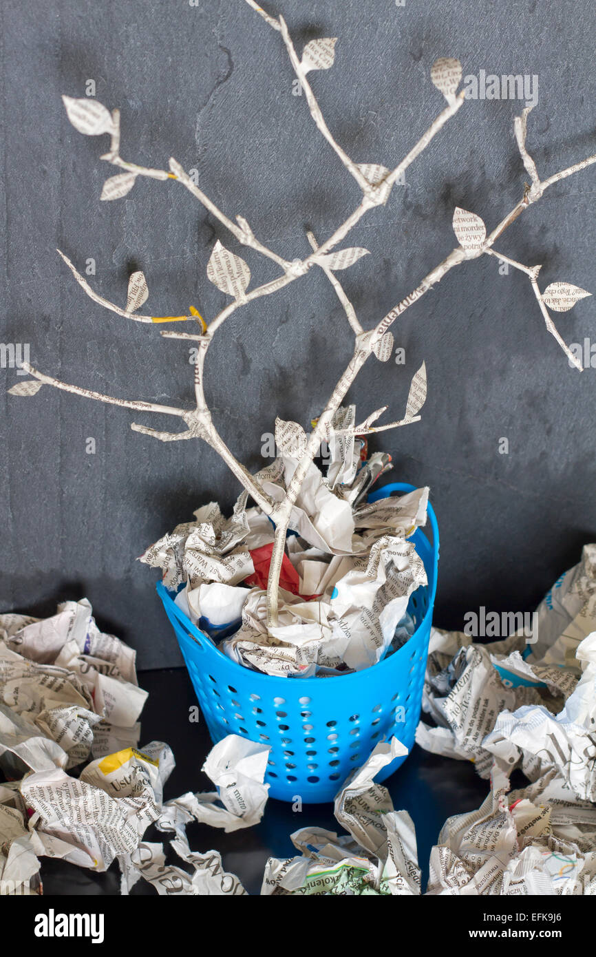 Paper tree in recycle trash can unique abstract concept Stock Photo - Alamy