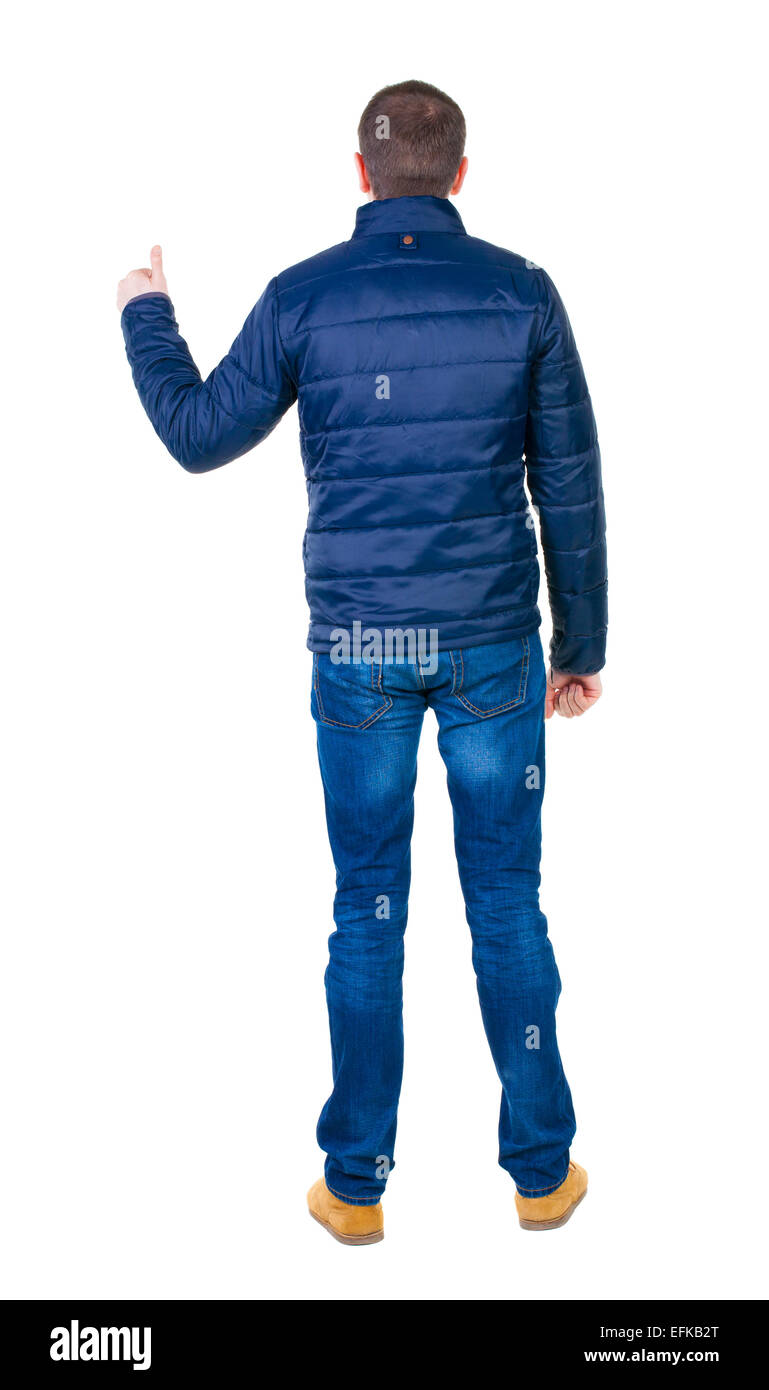 Back view of man in blue jacket shows thumbs up. Rear view people ...