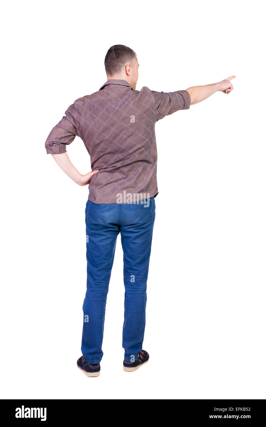Back view of pointing young men in shirt and jeans. Young guy gesture ...