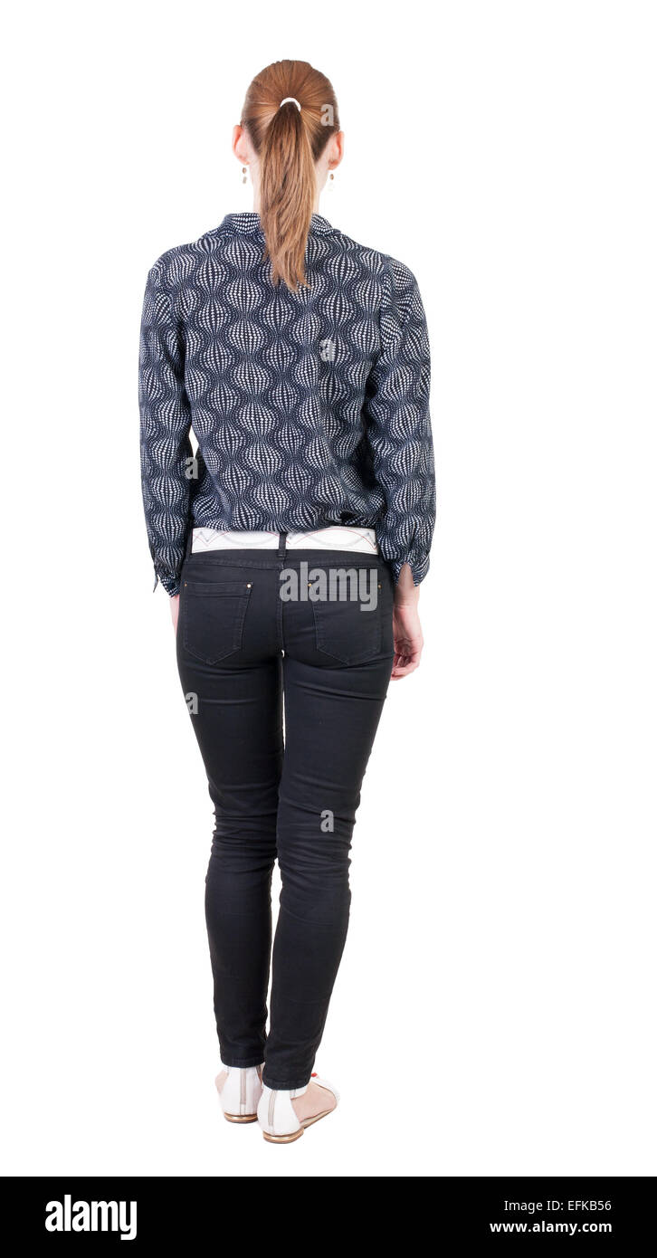 back view of standing young beautiful brunette woman. girl watching ...