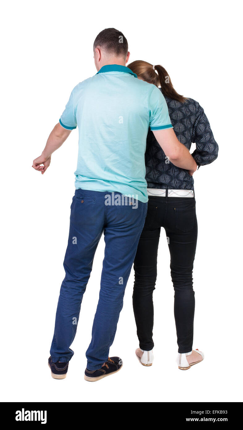 young couple pointing. Back view. Rear view people collection. backside ...