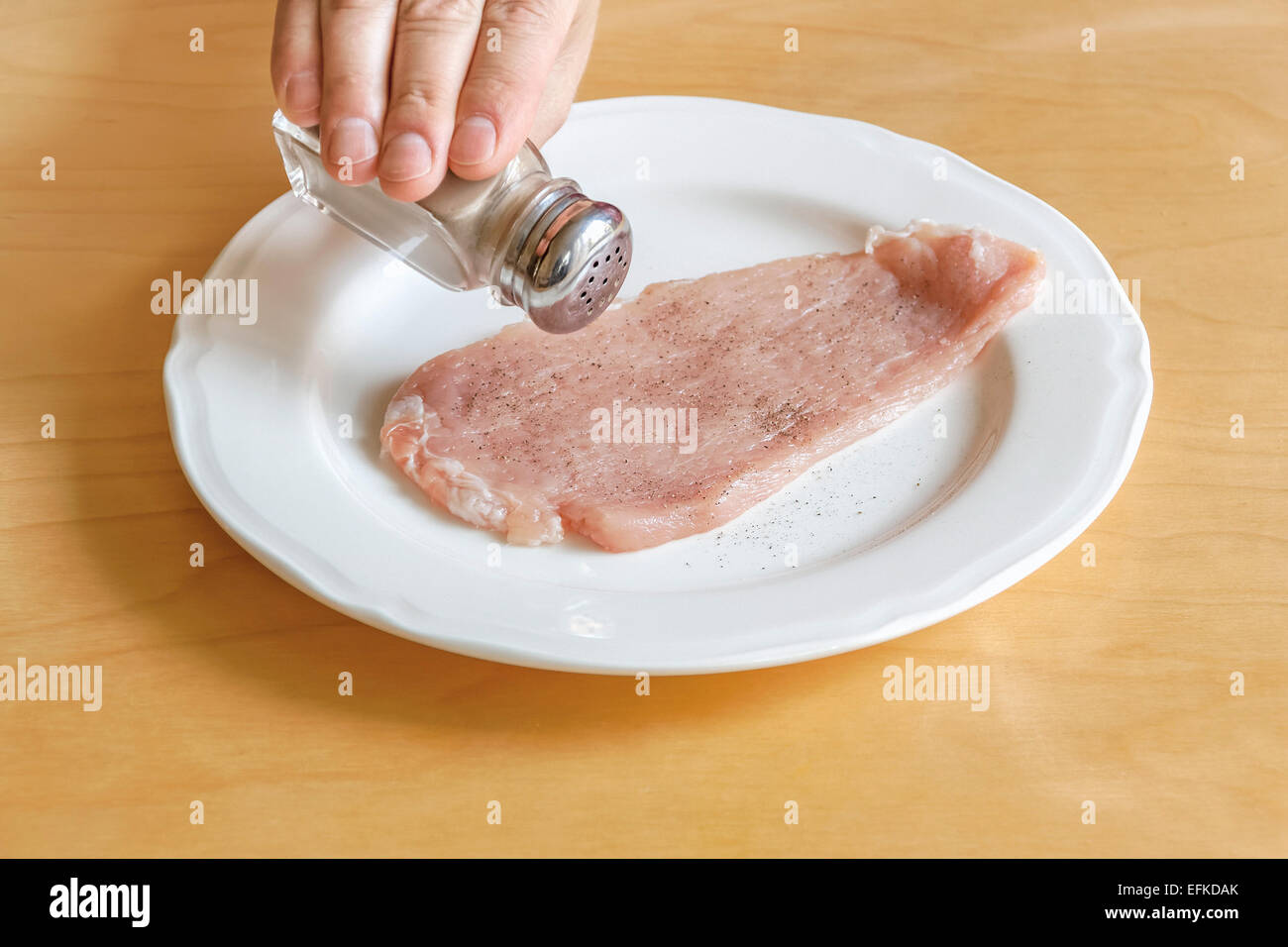 Adding pepper hi-res stock photography and images - Alamy