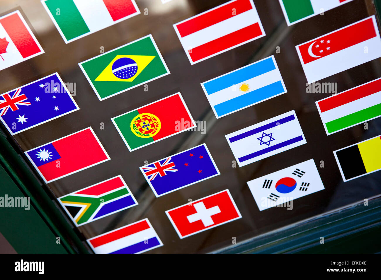 Various flags on a window Stock Photo - Alamy