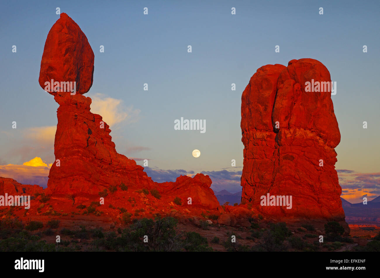 Balanced Rock in Arches National Park at sunset with moon rising Stock ...