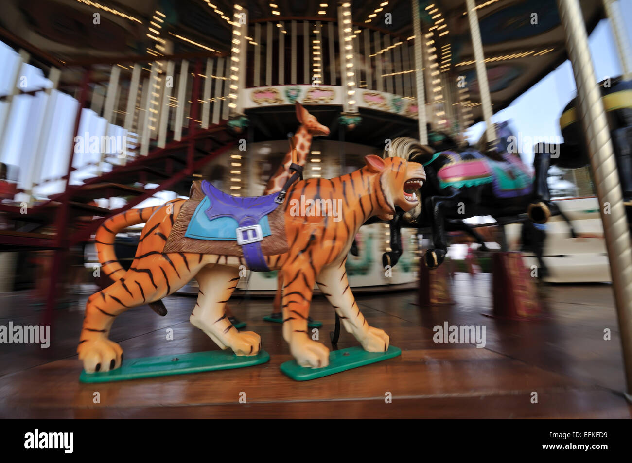 Old-fashioned style merry-go-round Stock Photo - Alamy