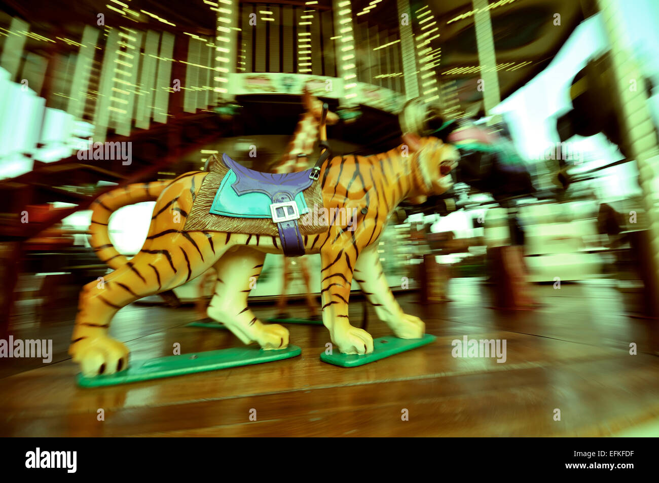 Old-fashioned style merry-go-round Stock Photo - Alamy