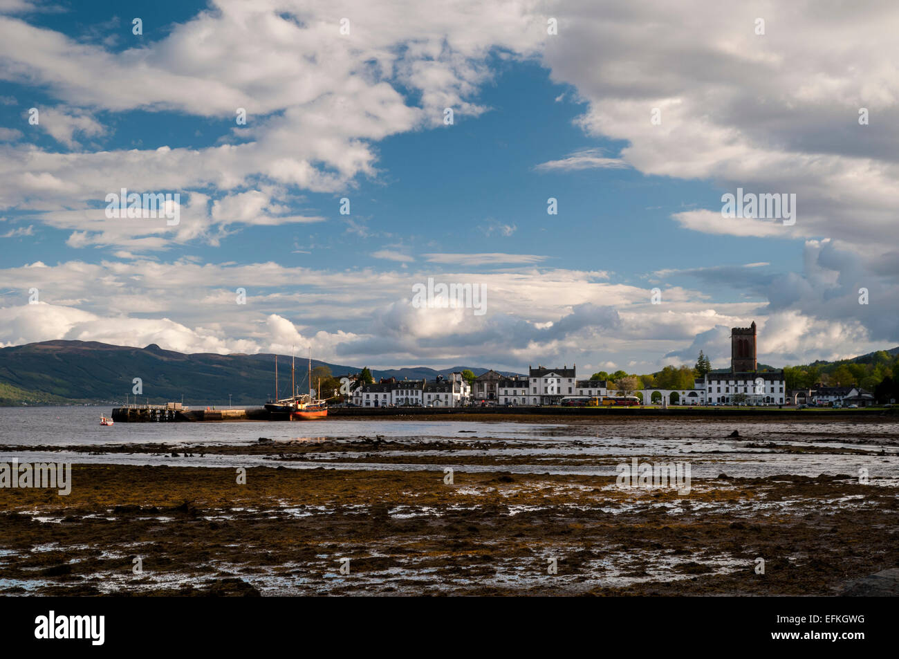 A view of Inveraray on Loch Fyne, across the bay at low tide, Argyll ...
