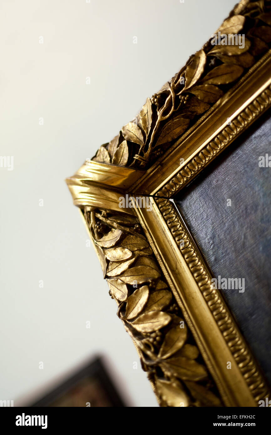 Golden picture frame in a museum Stock Photo - Alamy