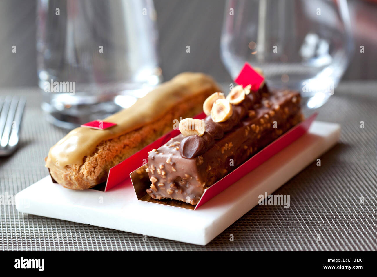 Two French pastries on a plate Stock Photo - Alamy
