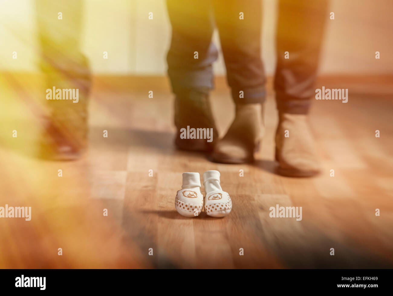 Parents waiting for a baby. Special lighting effect Stock Photo - Alamy