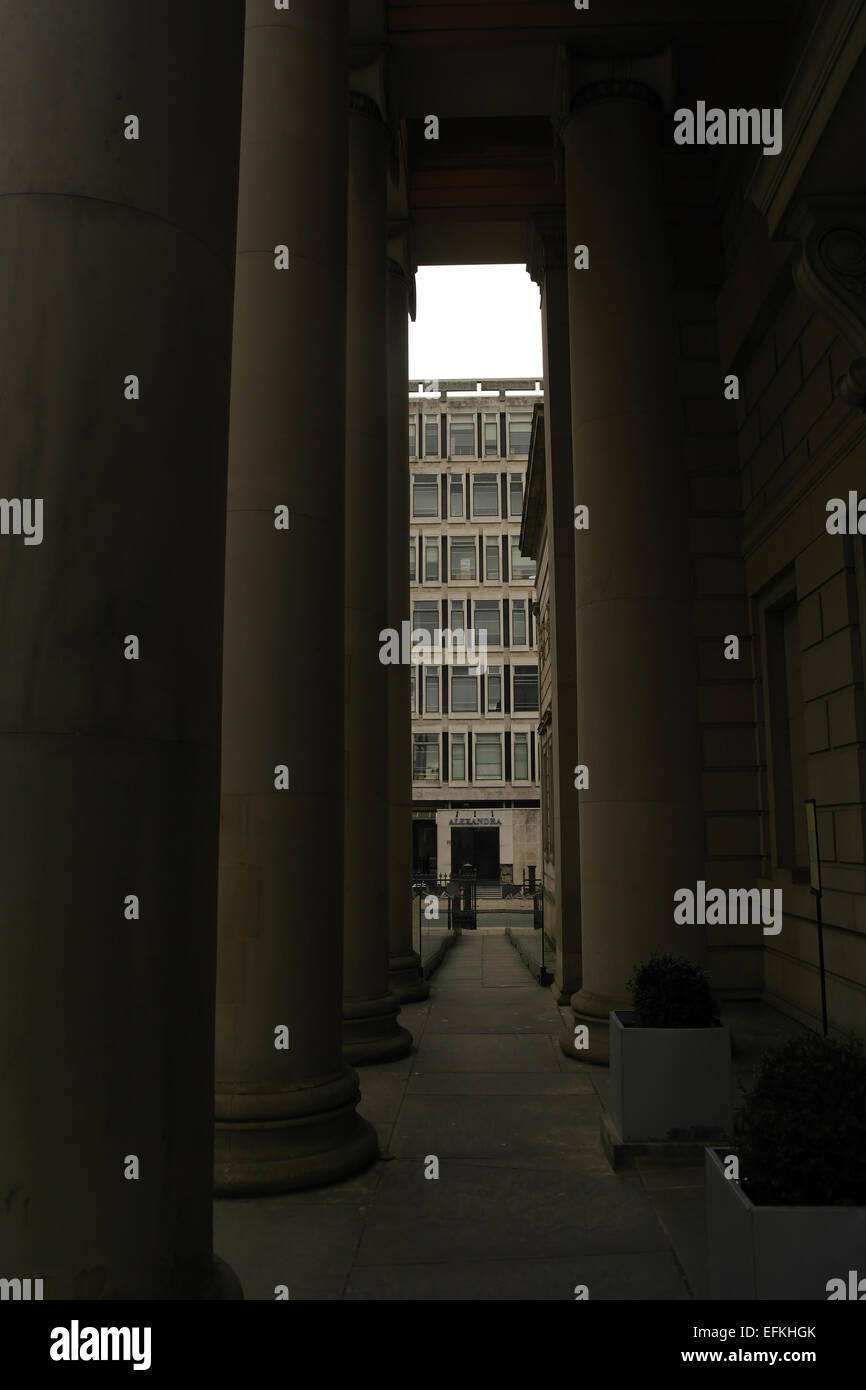 Grey sky portrait through ionic columns entrance Manchester City Art ...