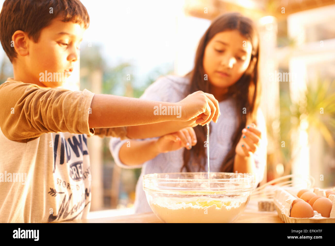 Children baking in kitchen Stock Photo - Alamy